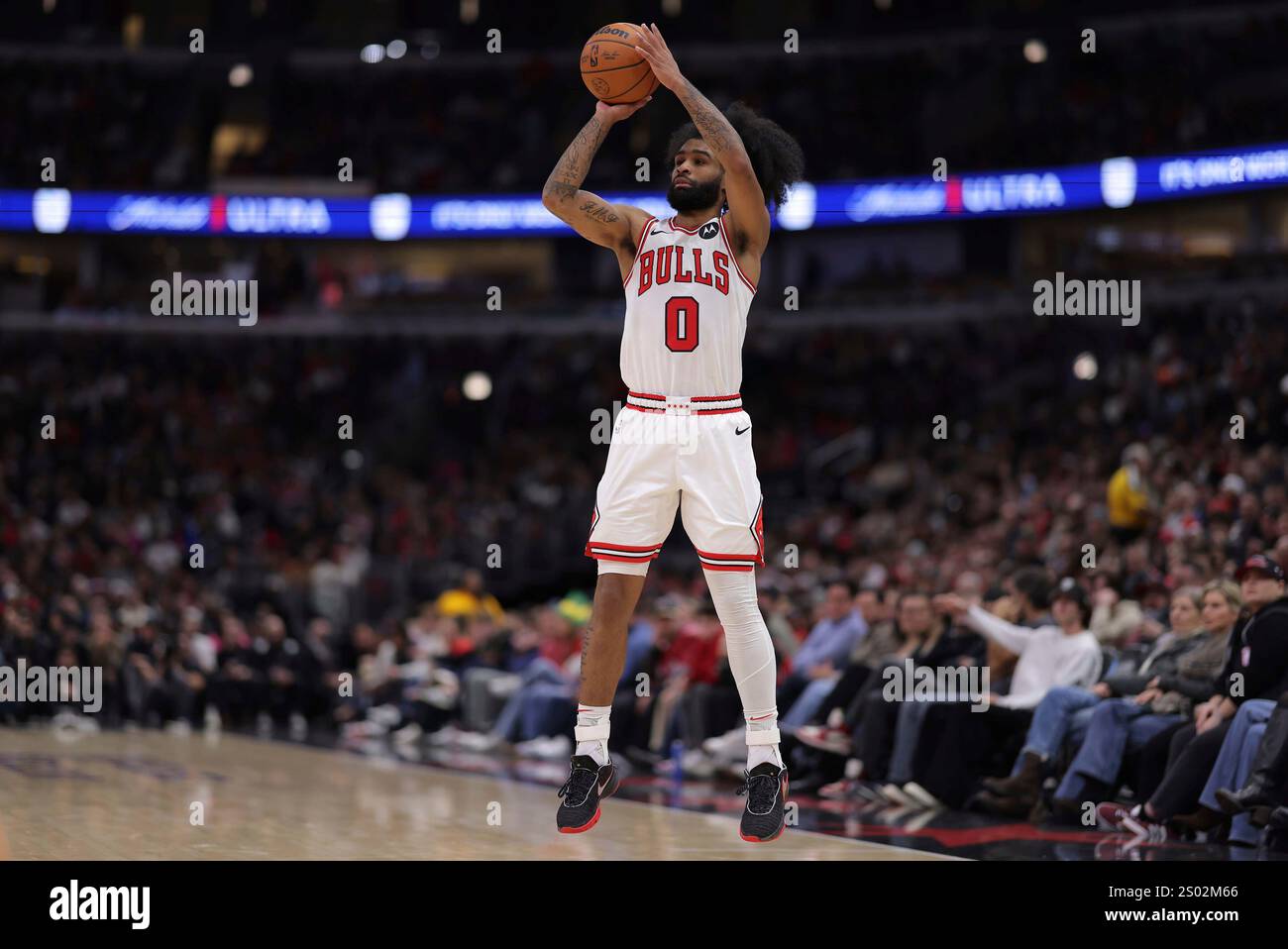 Chicago Bulls guard Coby White shoots a 3-point basket during the ...