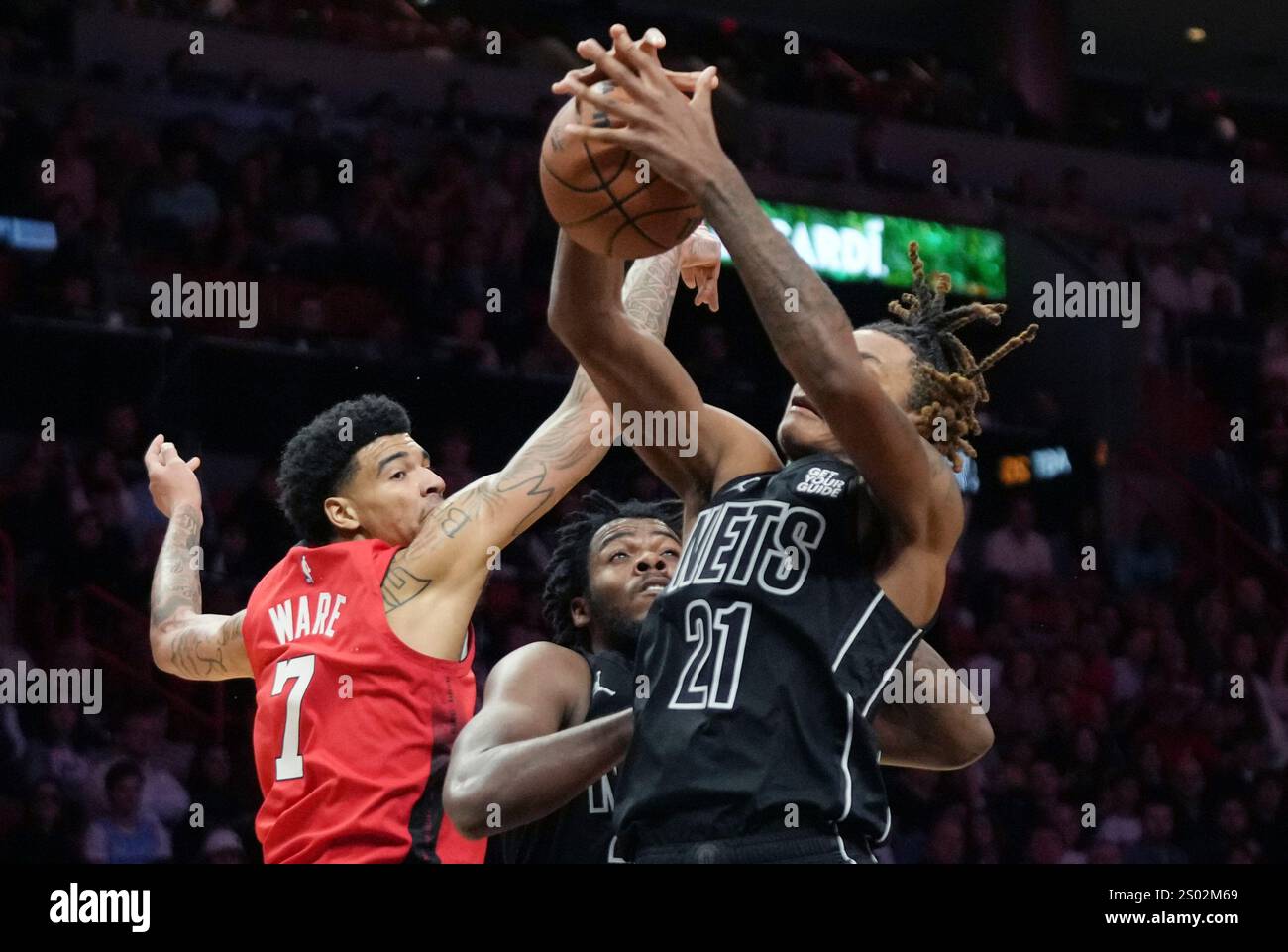 Miami Heat center Kel'el Ware (7) and Brooklyn Nets forward Noah ...