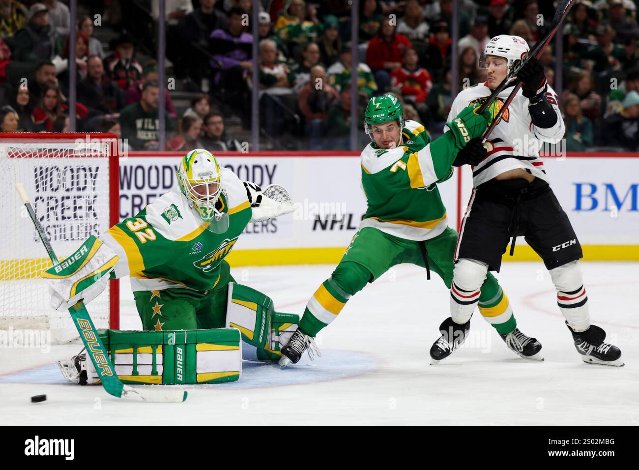 Minnesota Wild goaltender Filip Gustavsson (32) saves the puck while ...