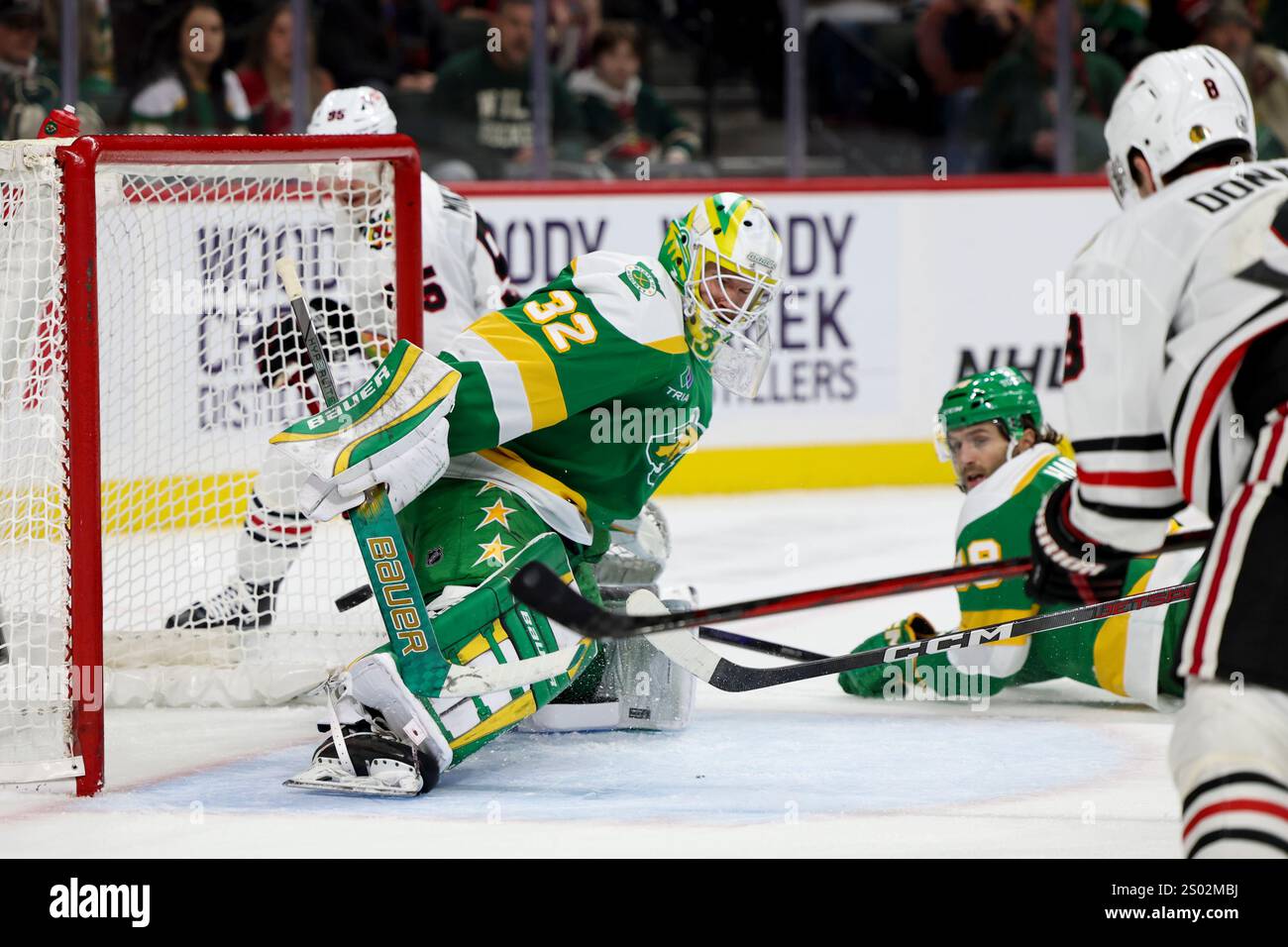 Chicago Blackhawks center Ryan Donato, right, scores a goal on ...