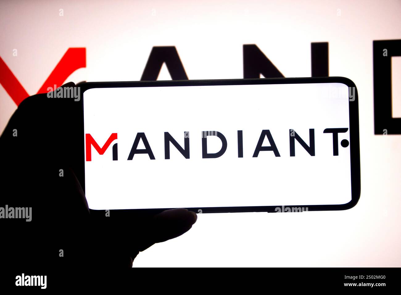 India. 17th Dec, 2024. In this photo illustration, a Mandiant logo is ...