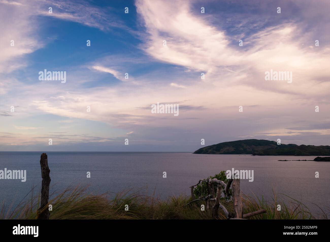 Pink sunset over the mountains and sea. Romblon, Philippines Stock ...