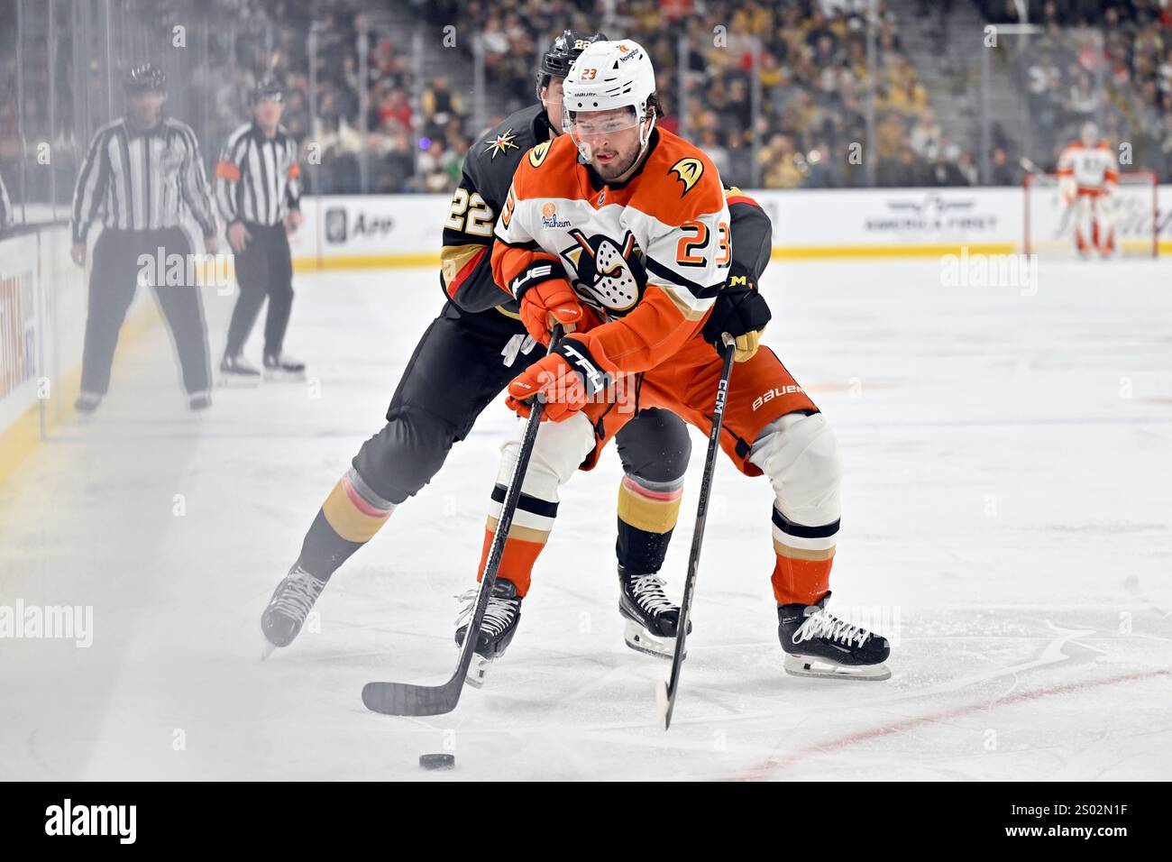 Anaheim Ducks center Mason McTavish (23) handles the puck against Vegas ...