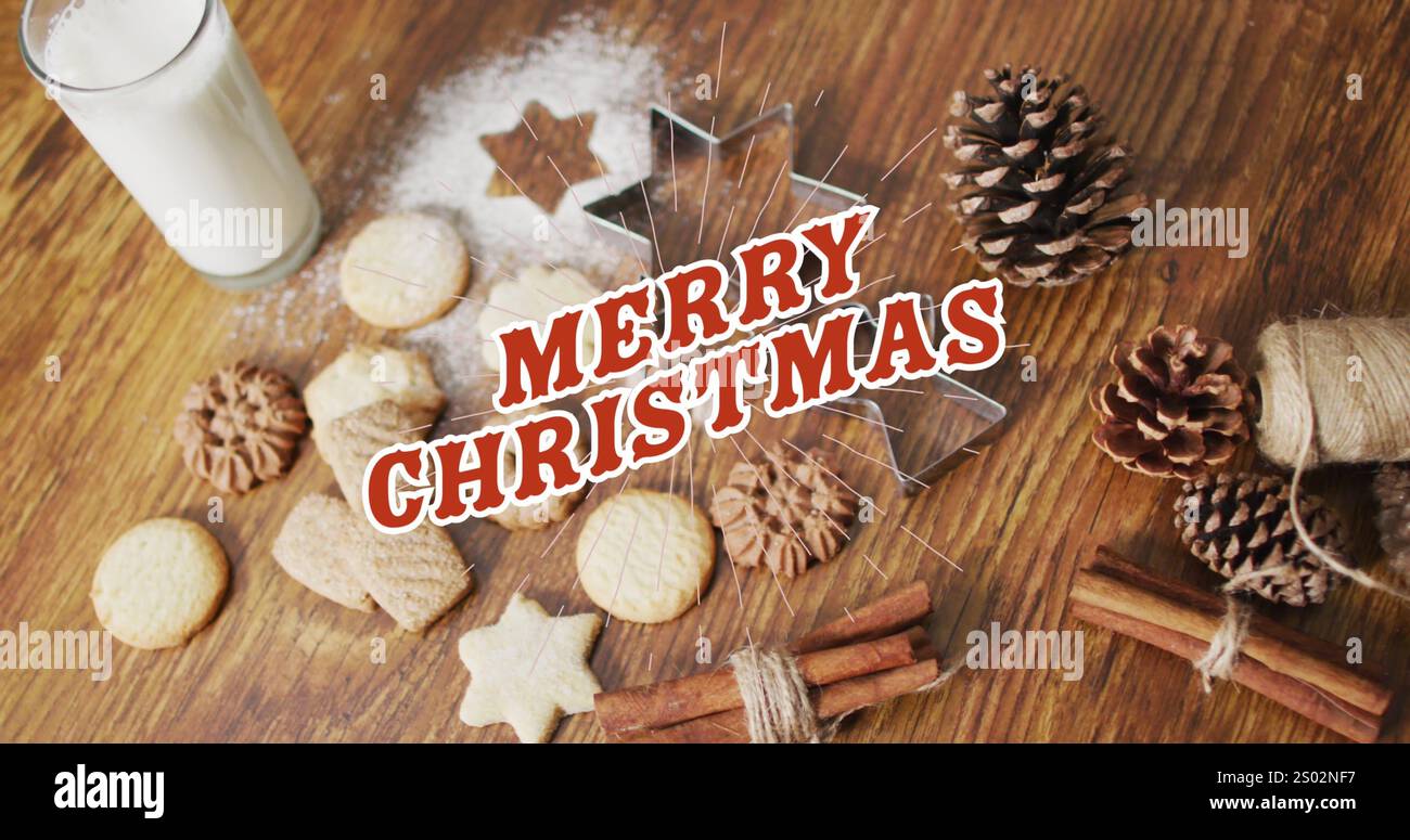 Image of merry christmas over cookies and decorations on wooden surface ...