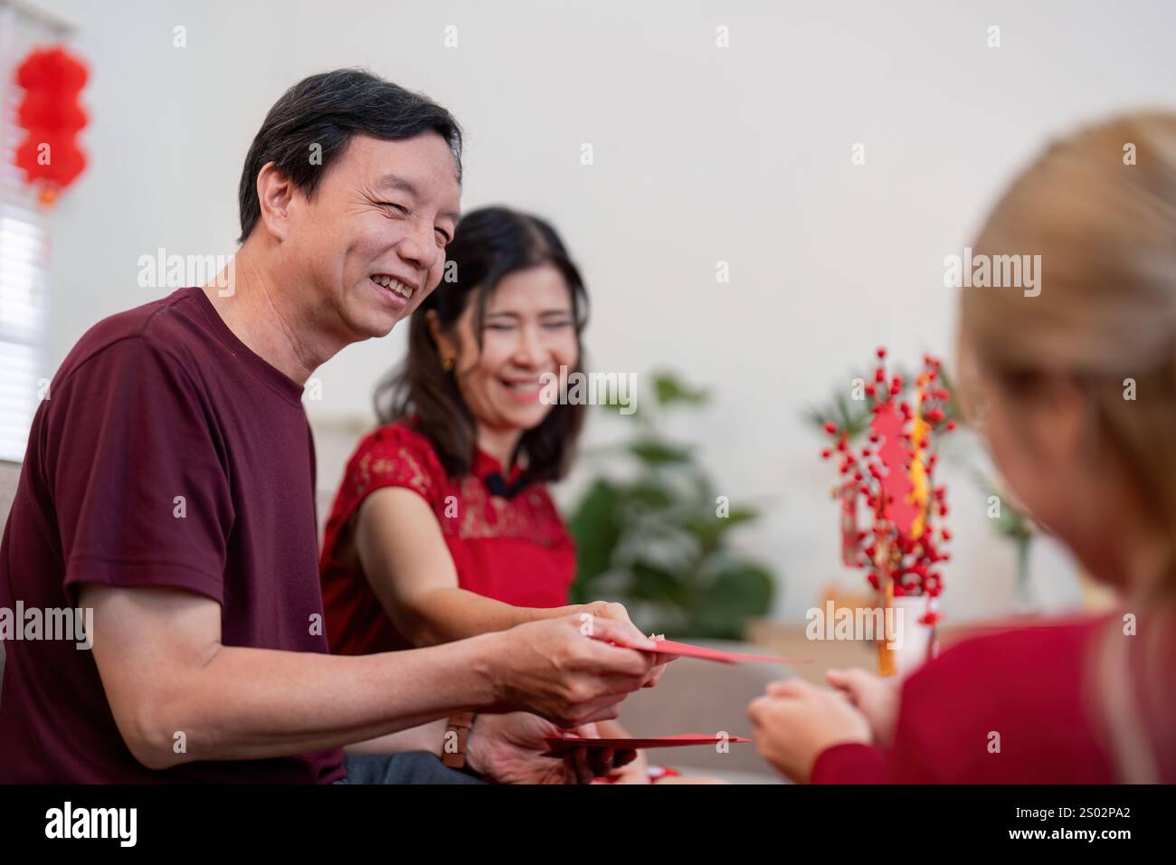 Celebrating chinese new year with family granddaughter and grandparents ...