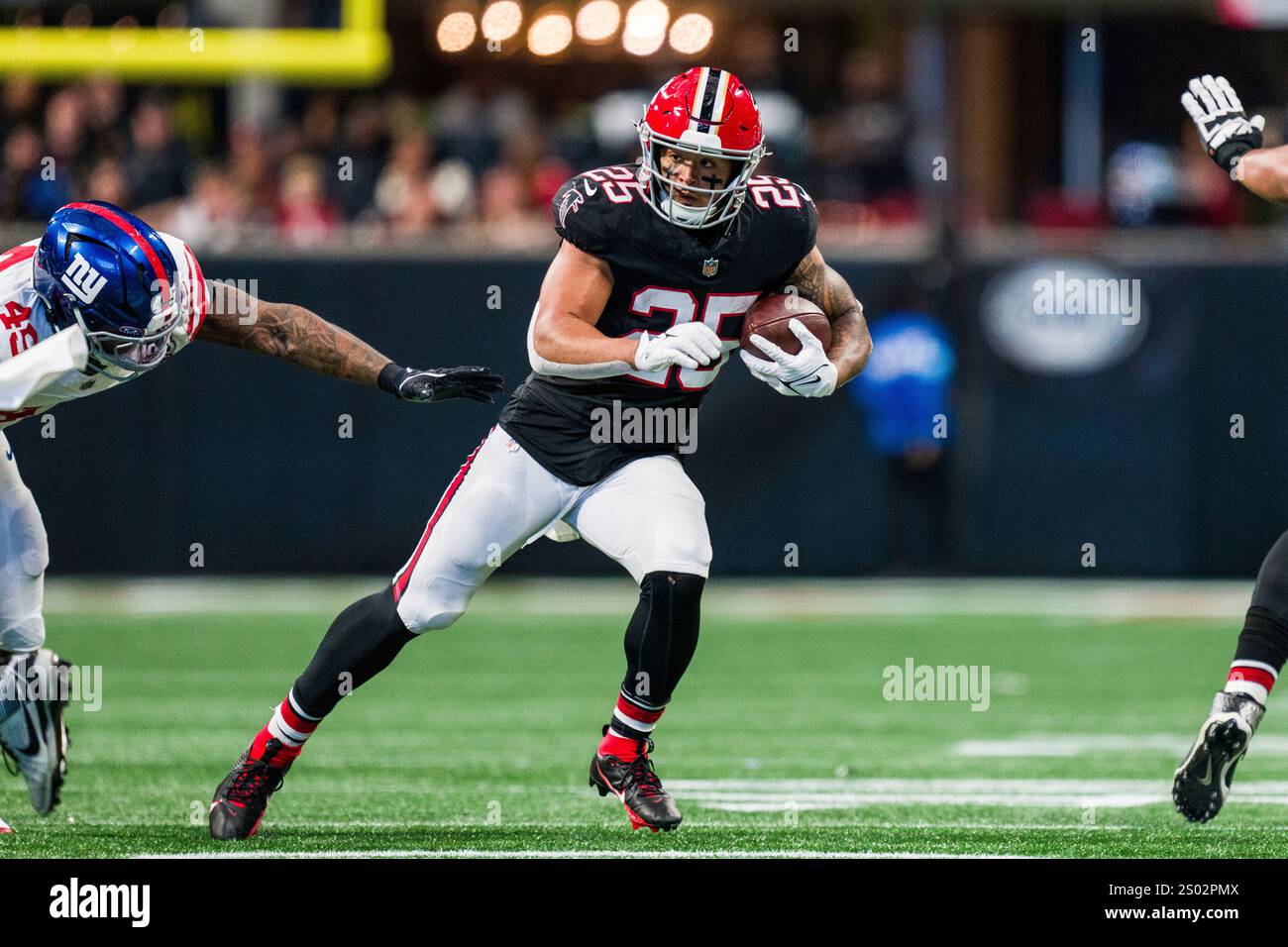 Atlanta Falcons running back Tyler Allgeier (25) runs the ball during ...