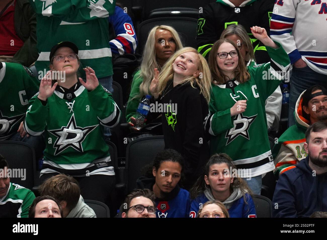 Dallas, United States. 20th Dec, 2024. Girls fans of Dallas Stars ...