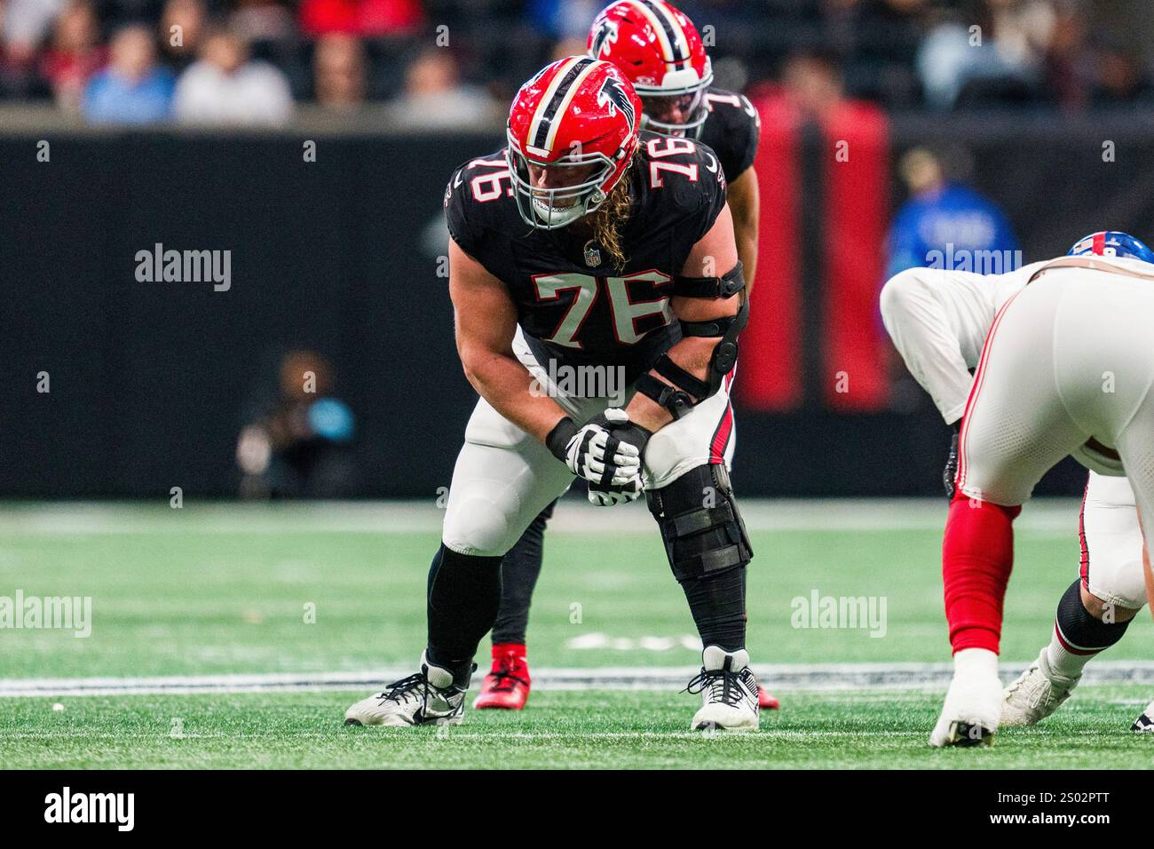 Atlanta Falcons offensive tackle Kaleb McGary (76) lines up during the ...