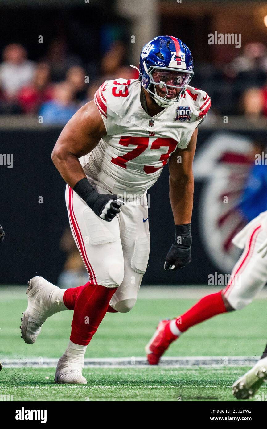 New York Giants offensive tackle Evan Neal (73) works during the first ...