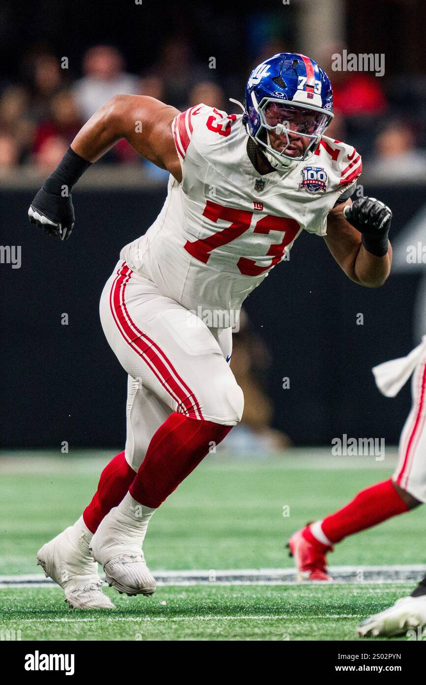 New York Giants offensive tackle Evan Neal (73) works during the first ...