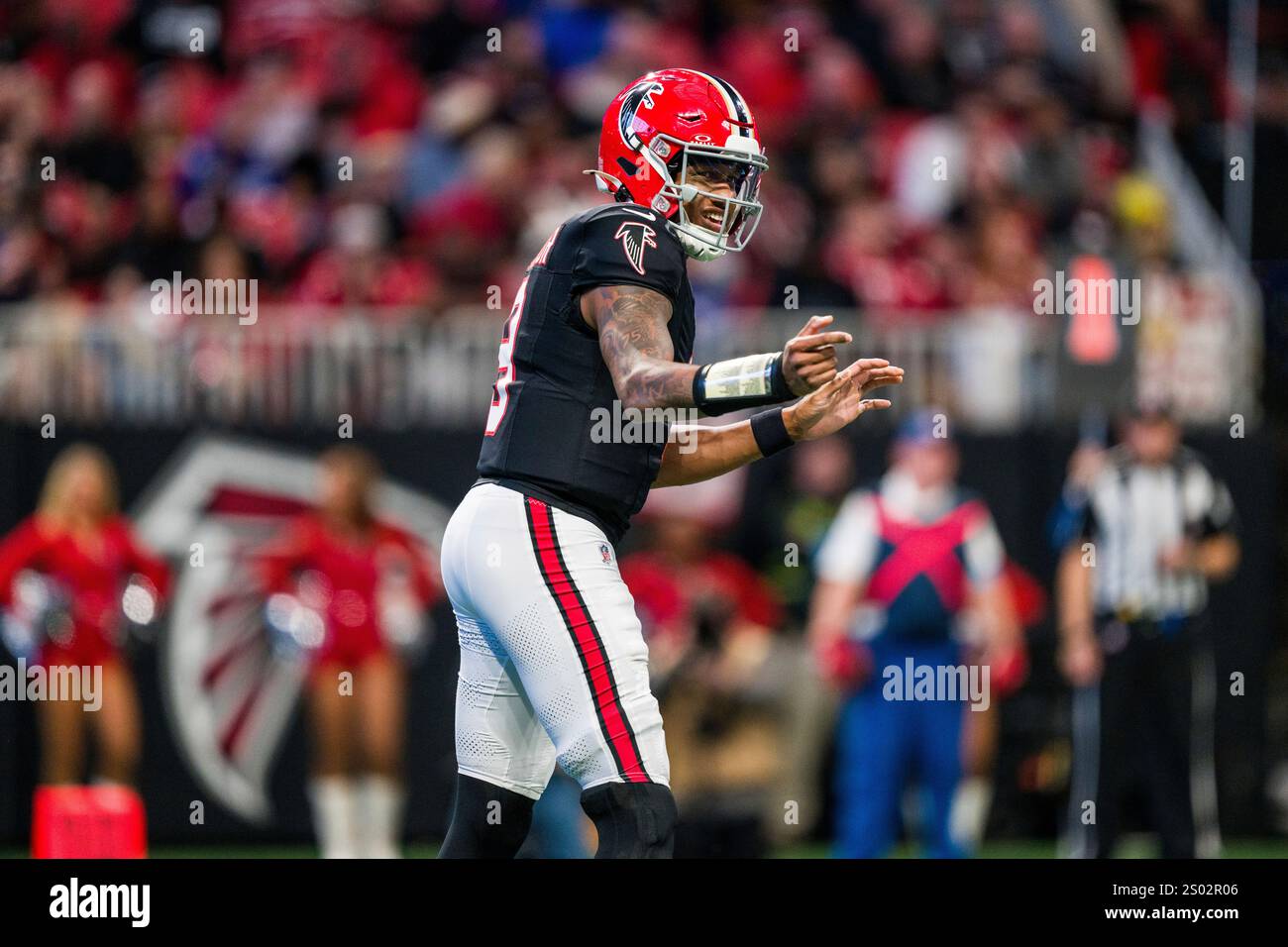Atlanta Falcons quarterback Michael Penix Jr. (9) signals during the ...