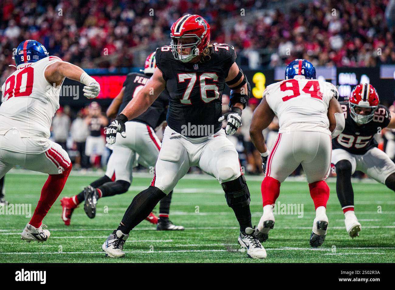 Atlanta Falcons offensive tackle Kaleb McGary (76) works during the ...