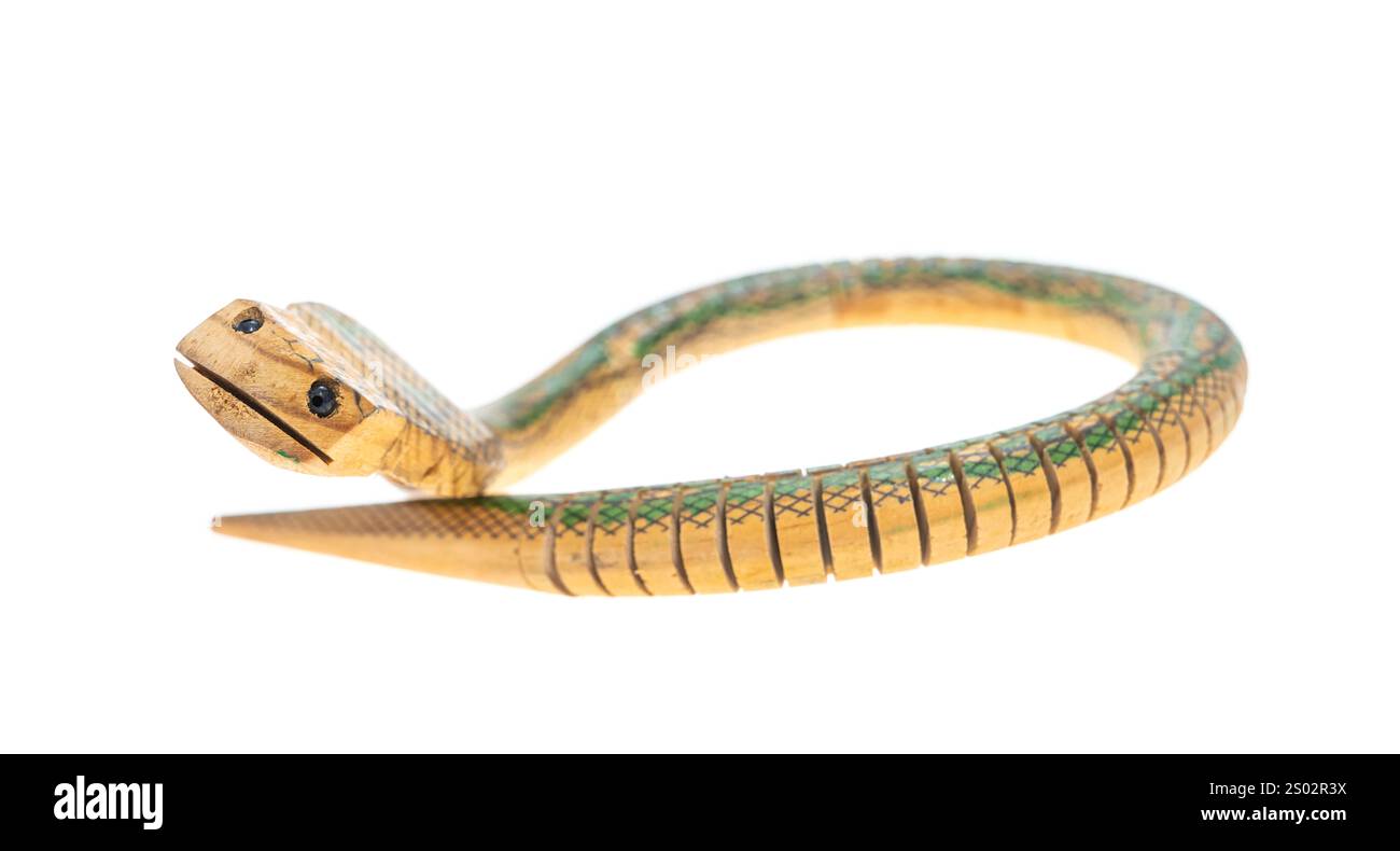 wooden snake asian toy isolated over a white background Stock Photo - Alamy