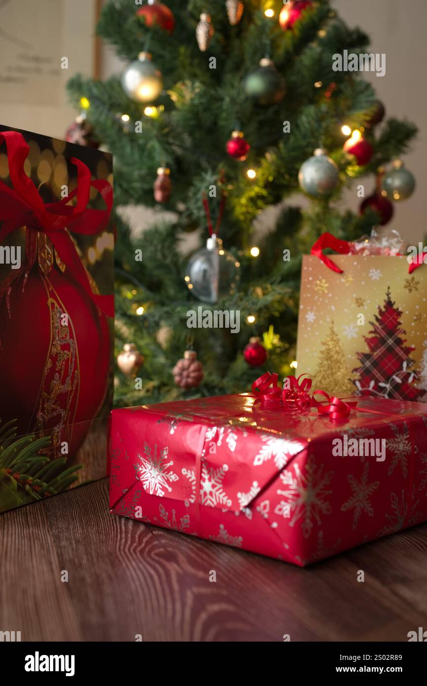 Christmas gifts wrapped under tree hi-res stock photography and images ...