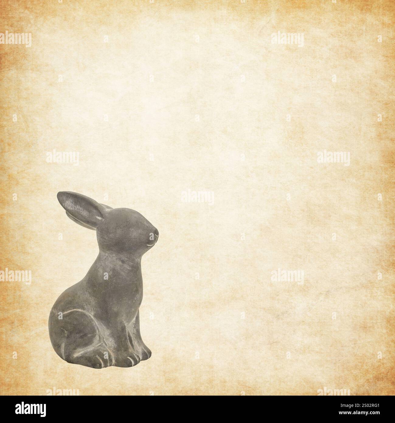 cute cement rabbit statue for decorate isolated on a grunge vintage ...