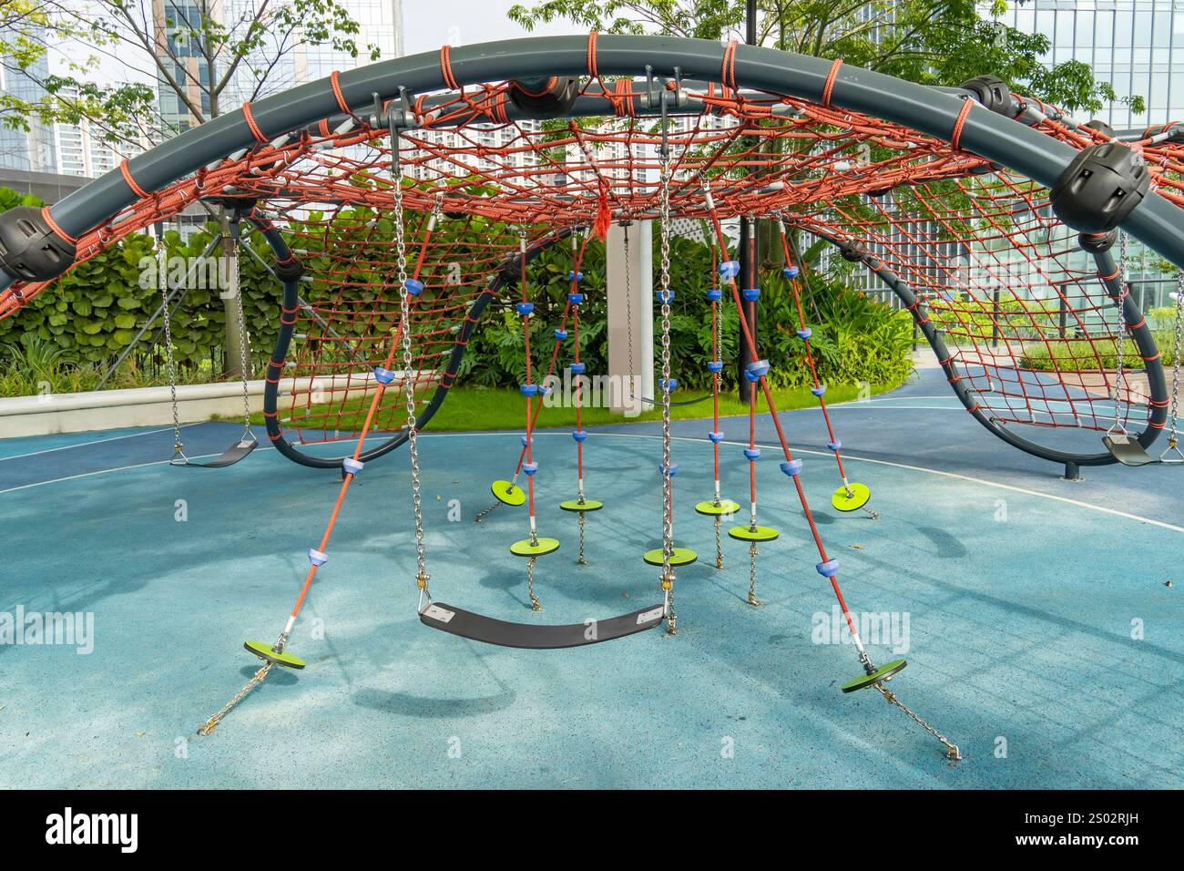 Public playground in modern suburb with colorful climbing construction ...