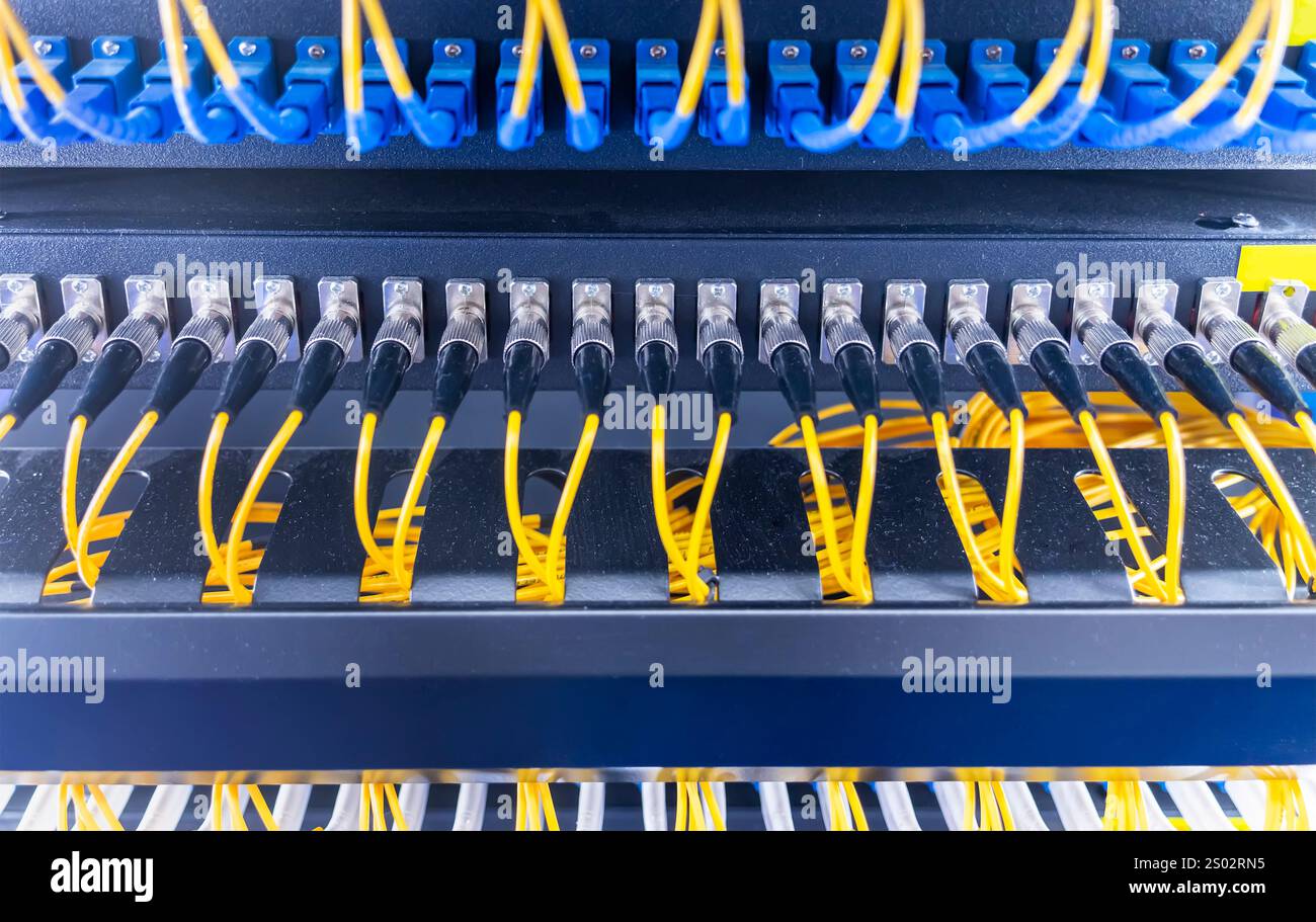 Fiber optic cable connect to communication Distribution point Stock ...