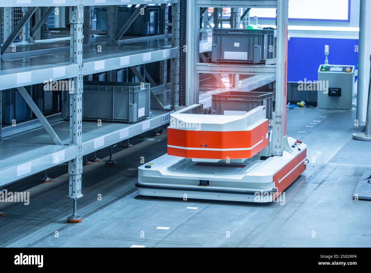 Automation in the warehouse controls a robot loader Robots sort and move boxes Stock Photo - Alamy