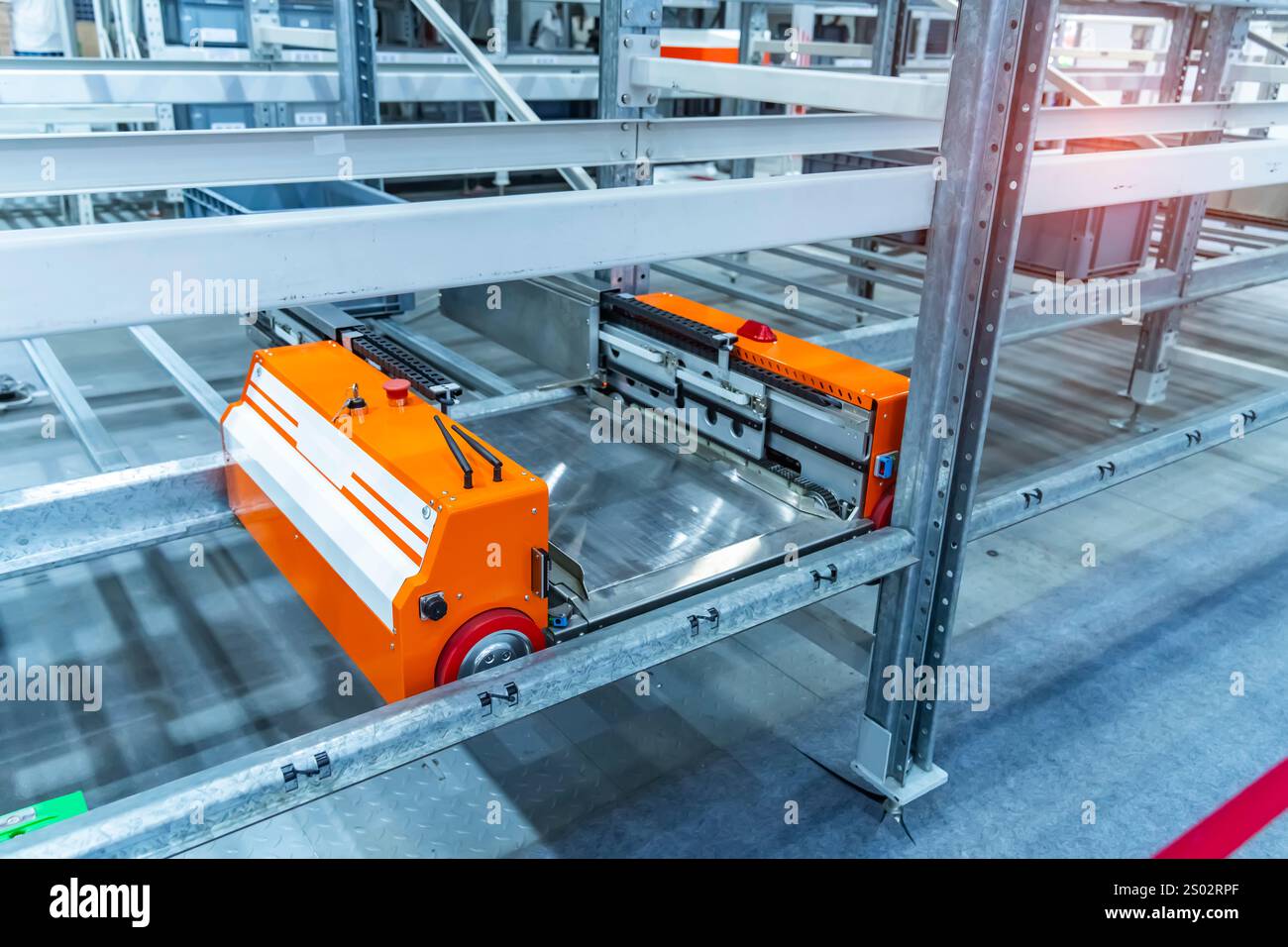 Automation in the warehouse controls a robot loader Robots sort and move boxes Stock Photo - Alamy