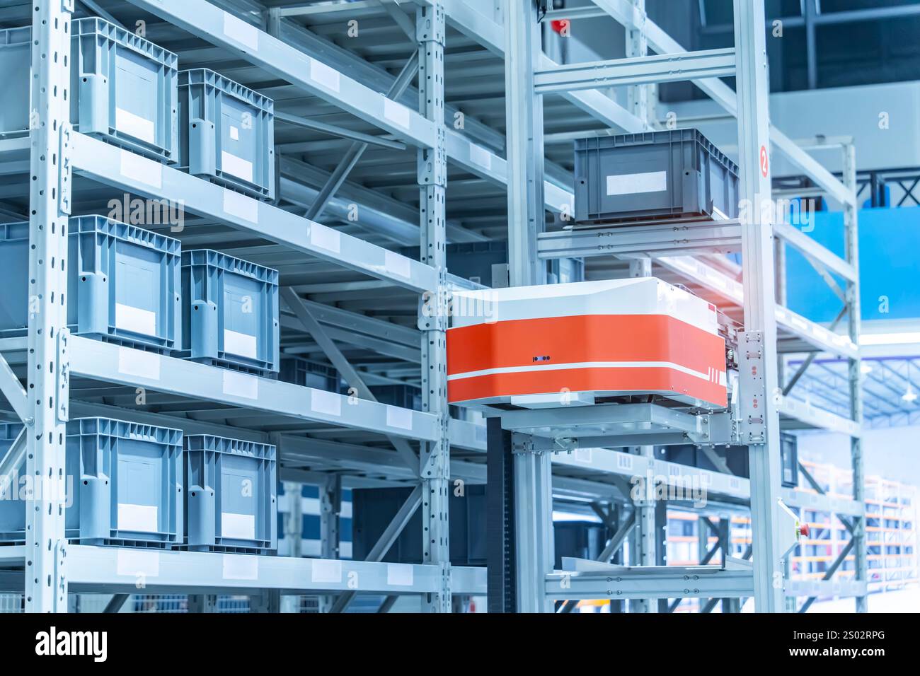 Automation in the warehouse controls a robot loader Robots sort and move boxes Stock Photo - Alamy