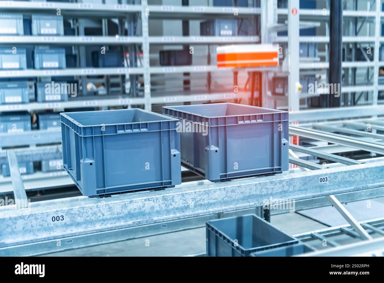 Automation in the warehouse controls a robot loader Robots sort and move boxes Stock Photo - Alamy