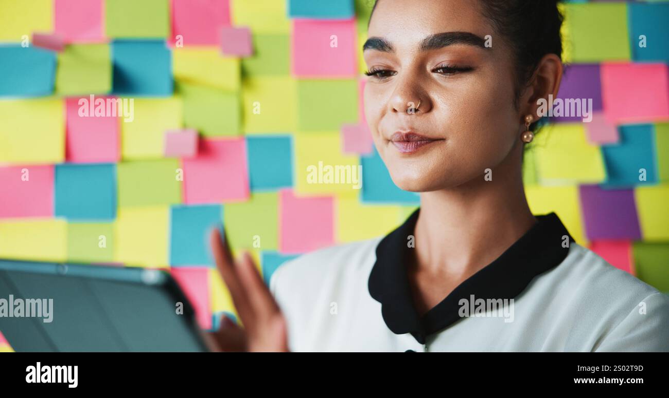 Idea, tablet and business woman in office with sticky notes for ...
