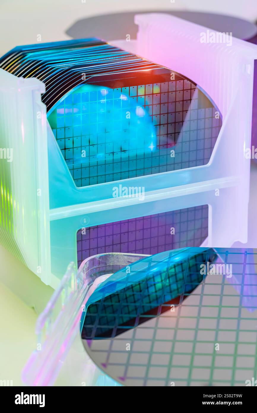 Silicon Wafers in white plastic holder box used in electronics for the ...