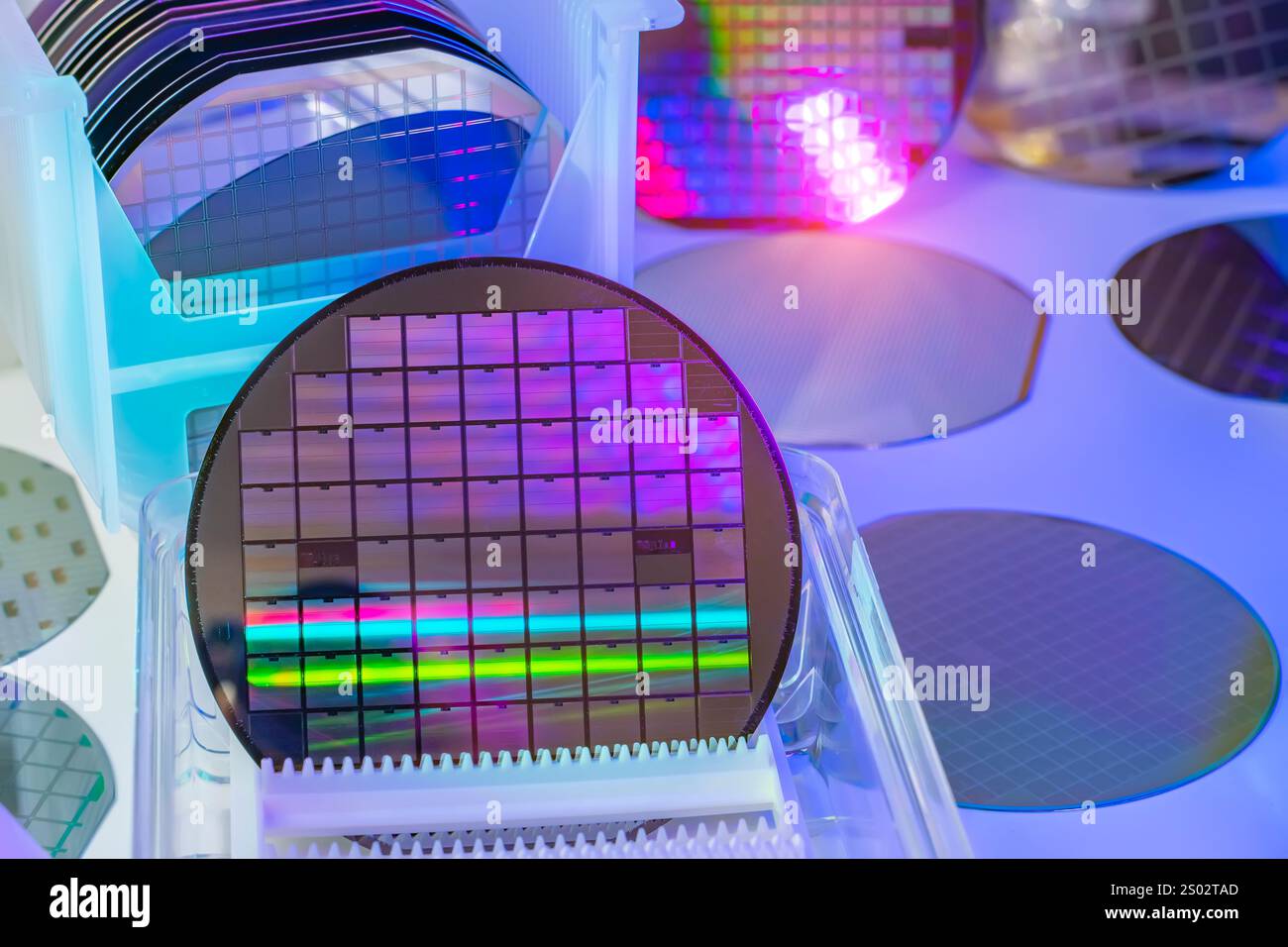 Silicon Wafers in white plastic holder box used in electronics for the ...