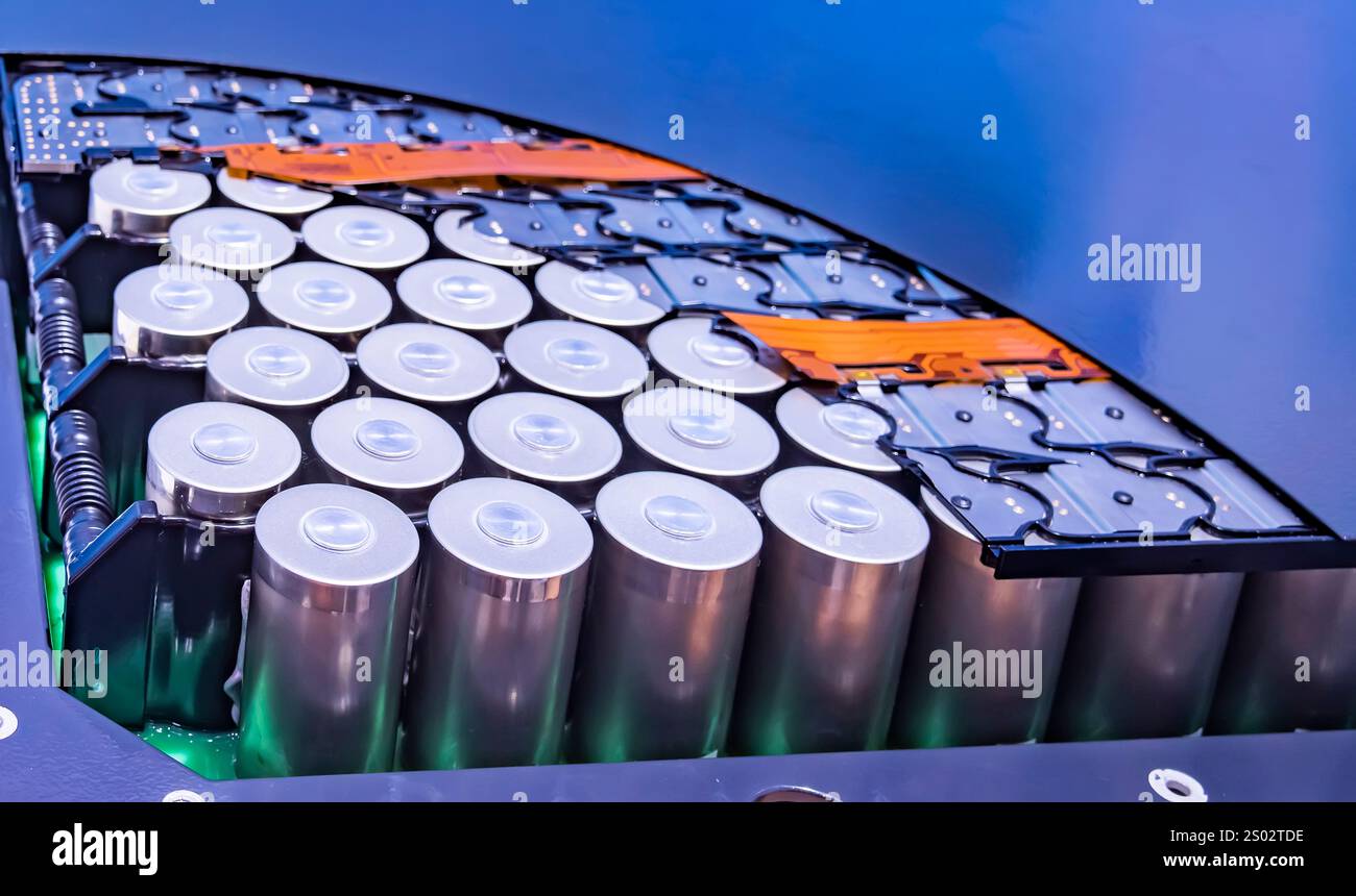 Metal parts with shiny steel cylindrical surface closeup. disassembled ...