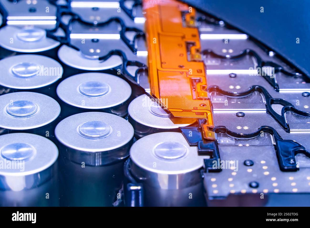 Metal parts with shiny steel cylindrical surface closeup. disassembled ...