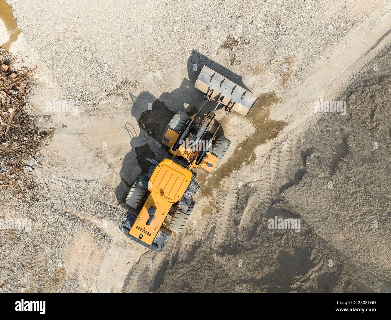 bulldozer on earthmoving at construction site, aerial view Stock Photo ...