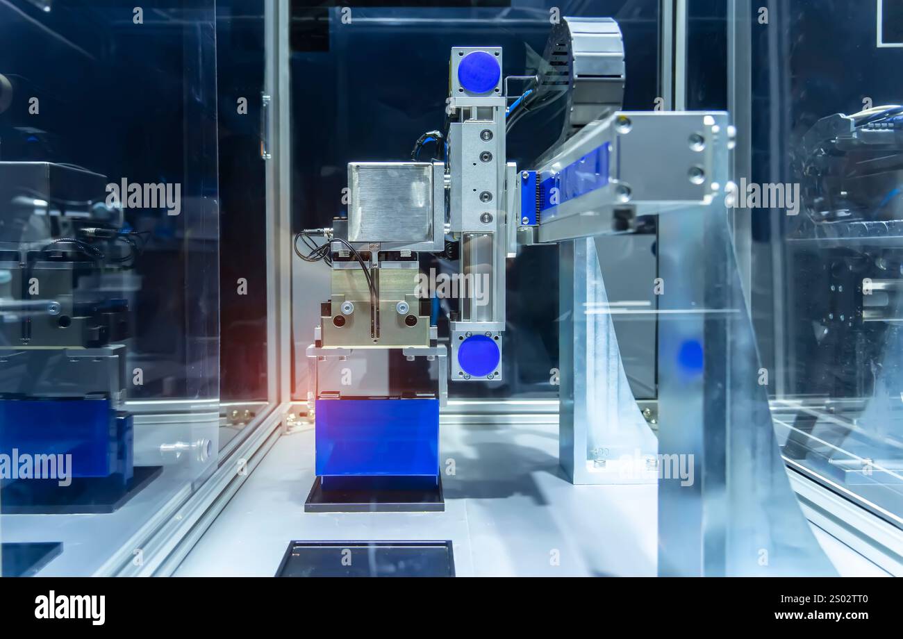 automatic robot arm at industrial manufacture factory of lithium ...