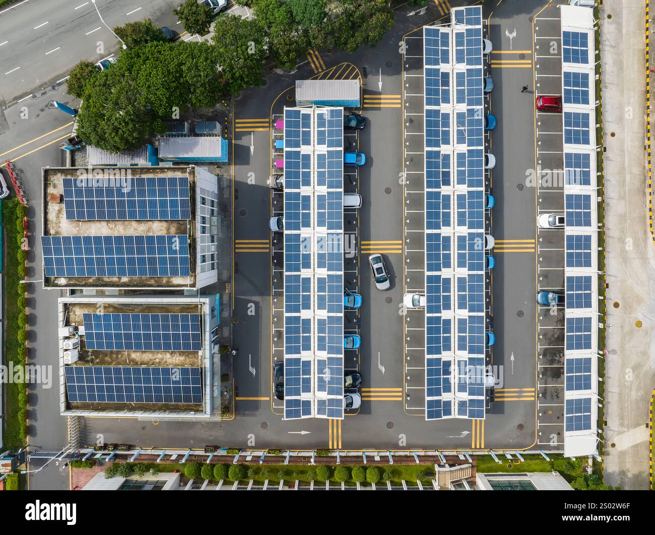Aerial view above innovative solar panels located on a car parking lot ...