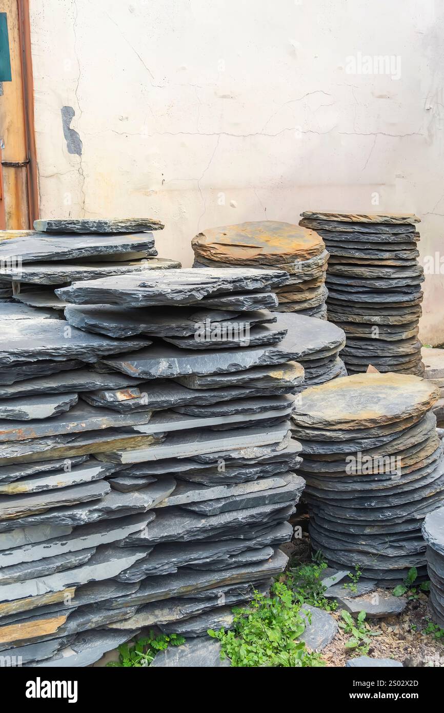 Stack flat slate stones cladding of wall used for flooring, walkways or ...
