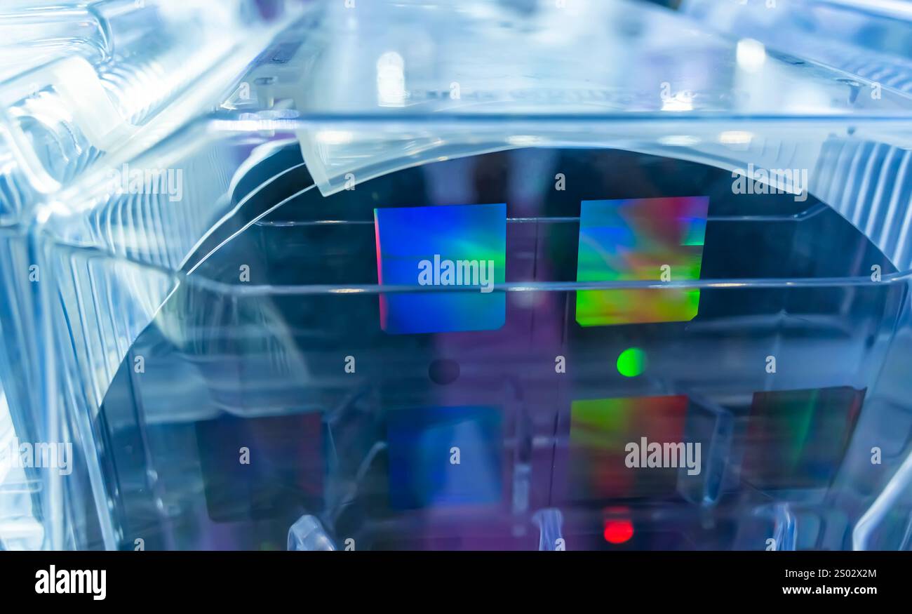 Silicon Wafer Under Cleanroom Fabrication in plastic holder box Stock ...