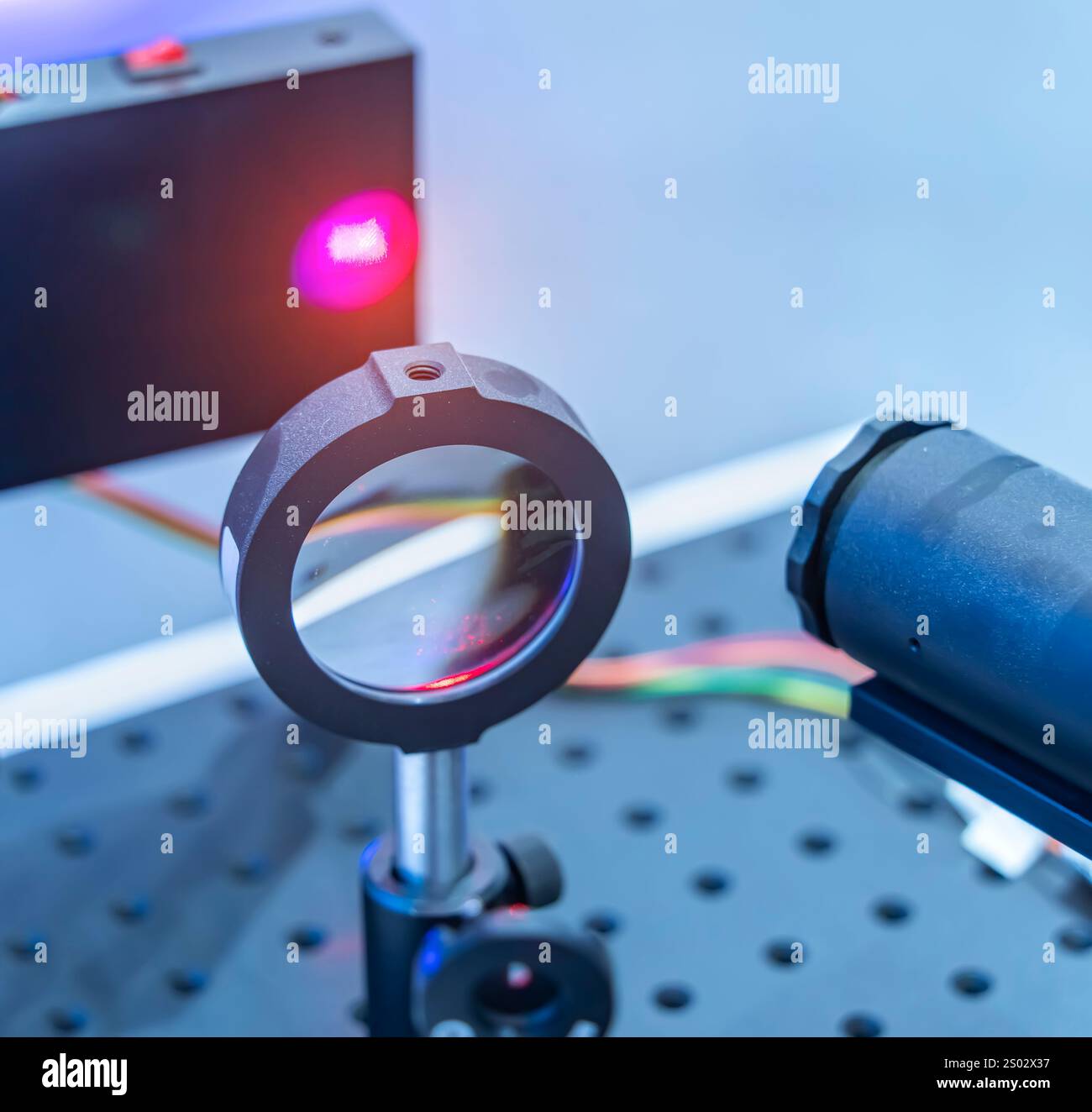 Experiment with laser device in optical laboratory Stock Photo - Alamy