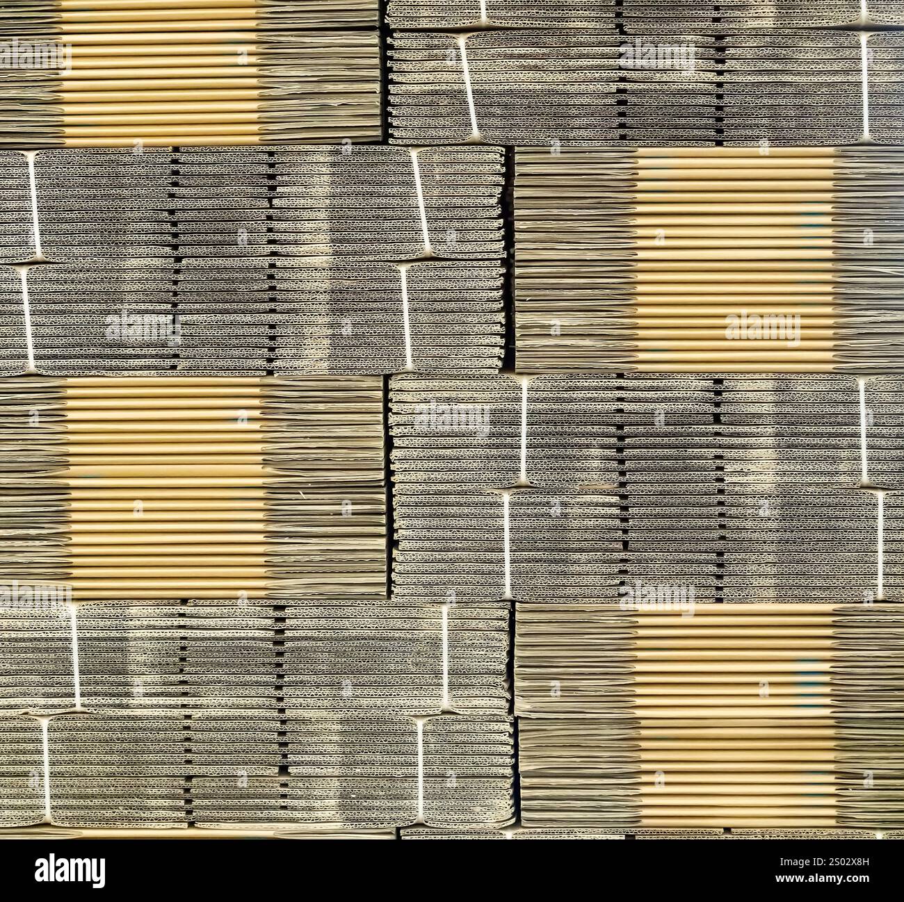 Stacked brown corrugated cardboard boxes flattened boxes Stock Photo ...