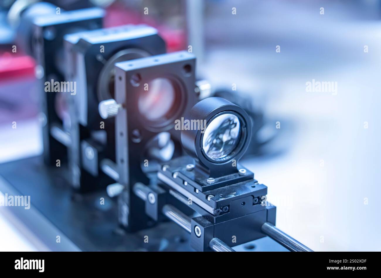 Experiment with laser device in optical laboratory Stock Photo - Alamy