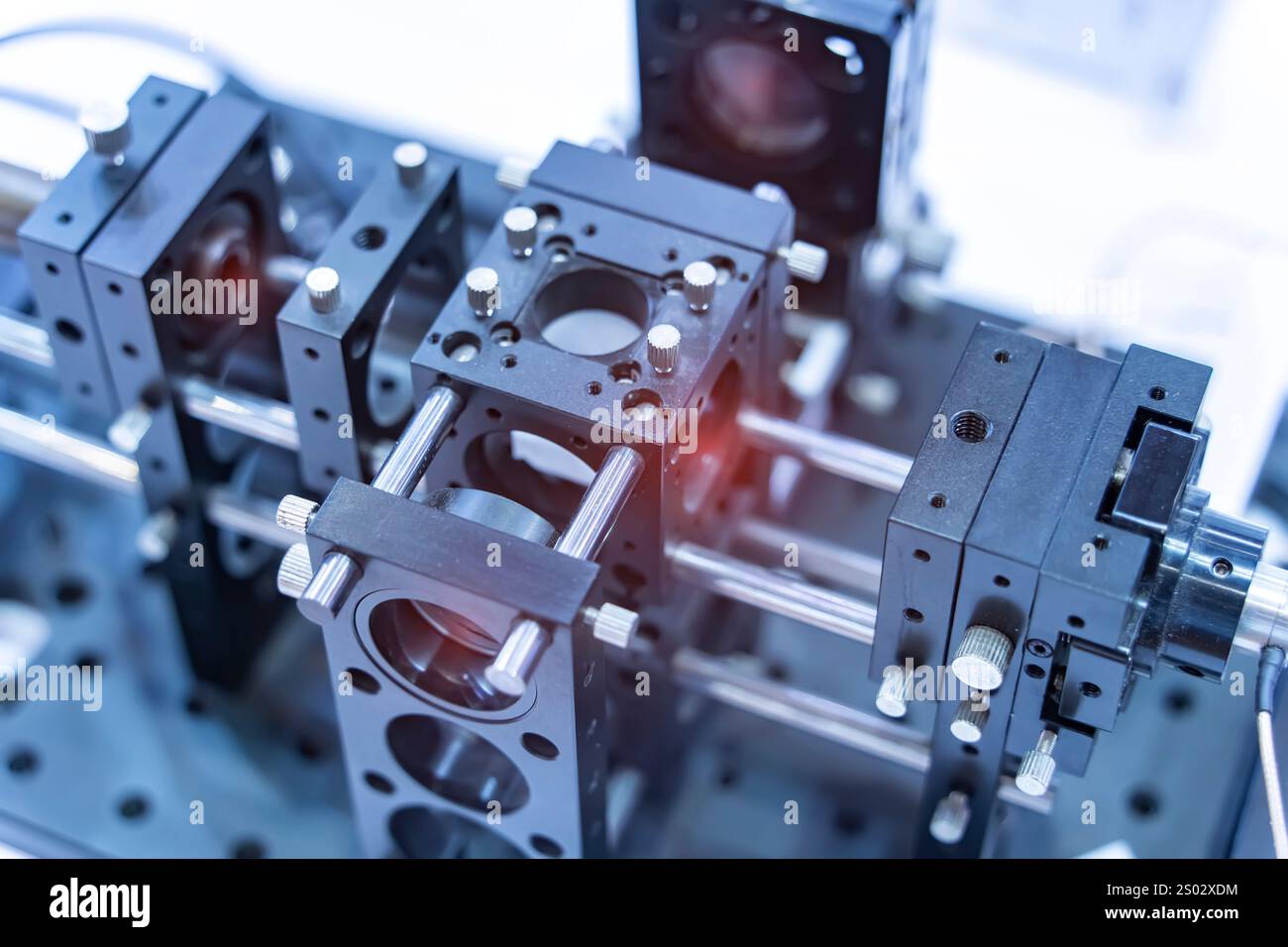 Experiment with laser device in optical laboratory Stock Photo - Alamy