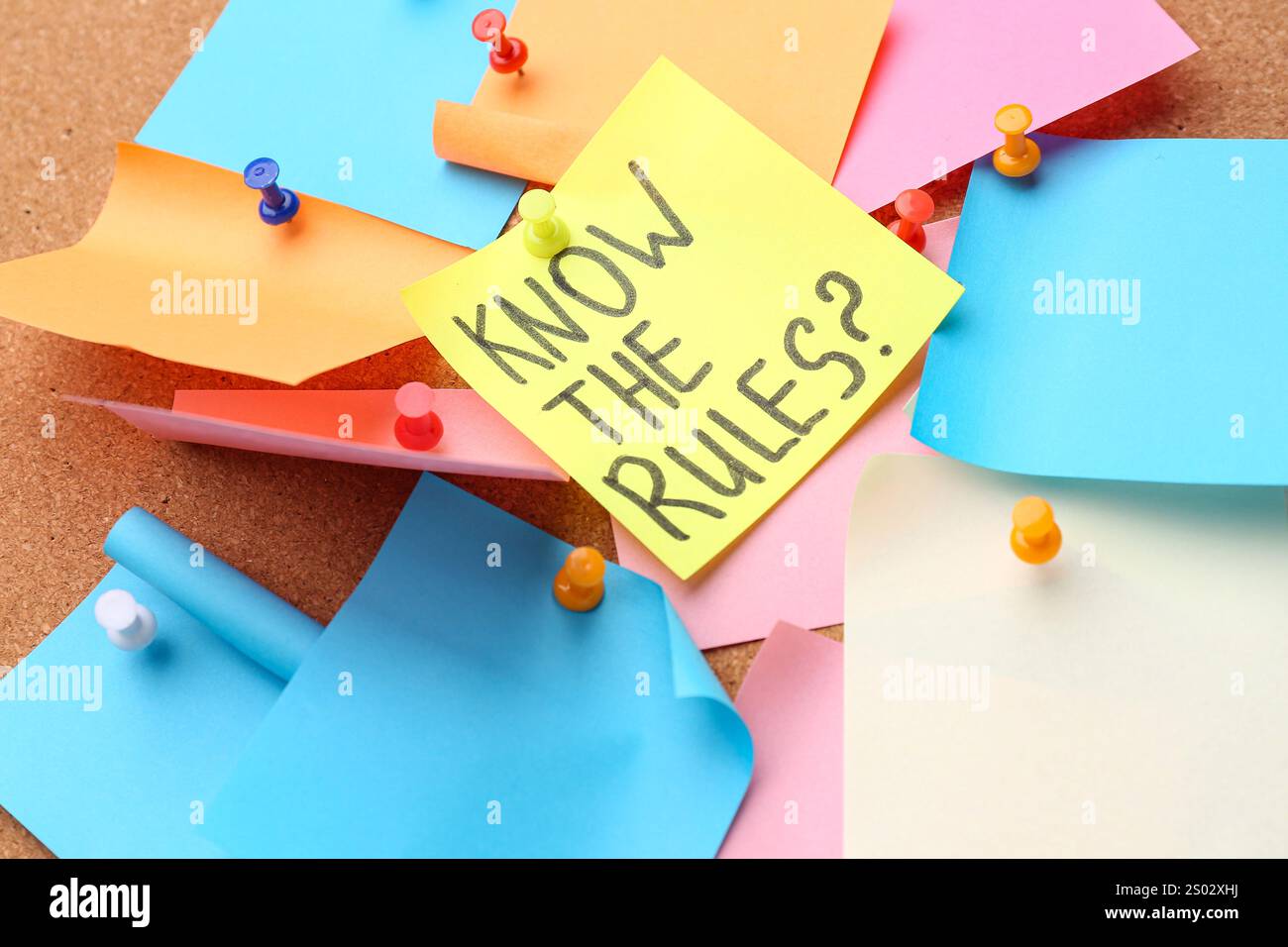 Papers with text KNOW THE RULES on pin board, closeup Stock Photo - Alamy
