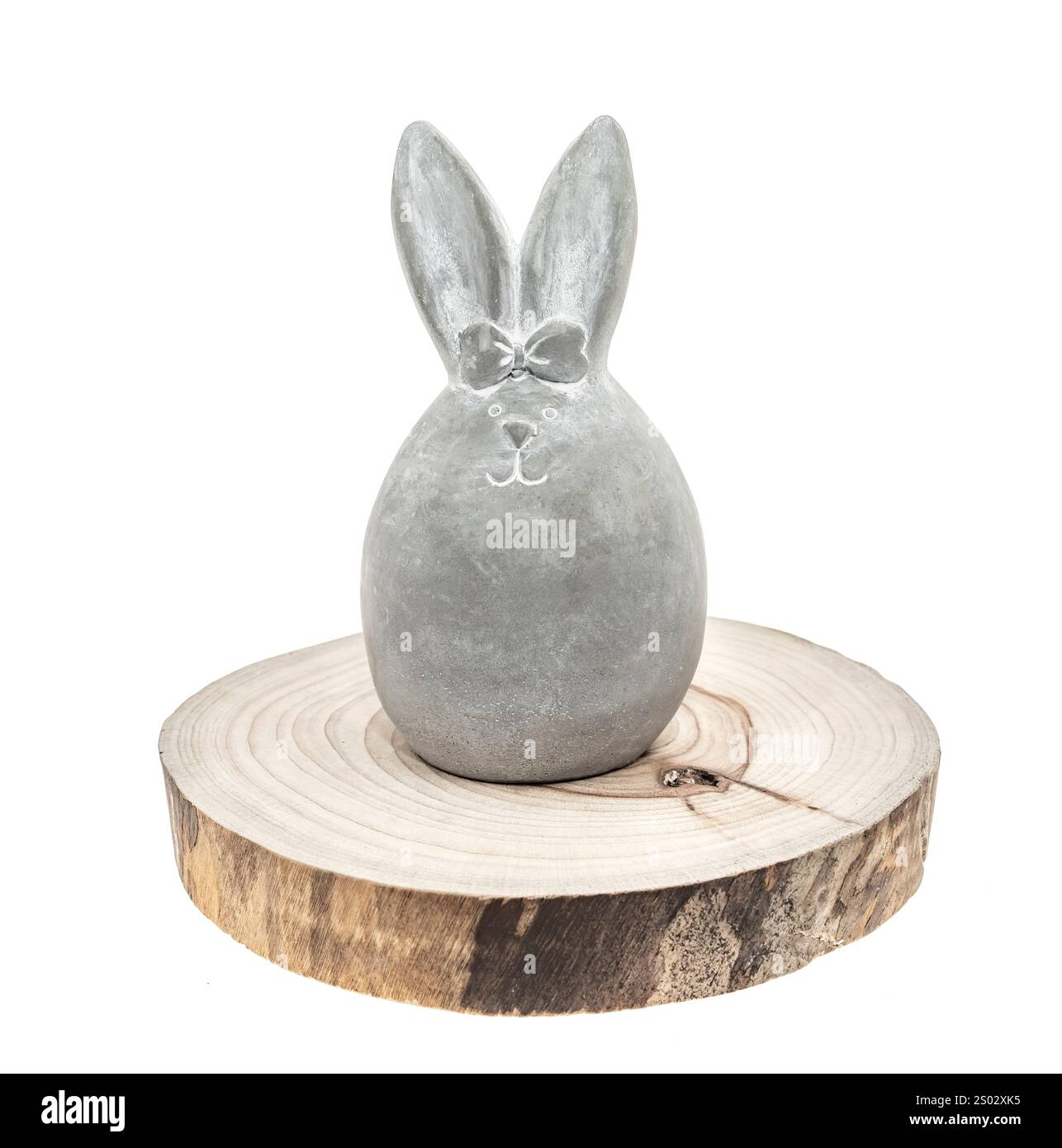 cute cement rabbit statue for decorate on round wood textured ...