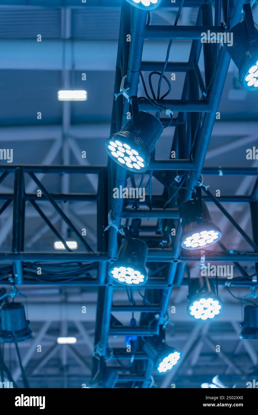 LED stage lighting fixtures at the show Stock Photo - Alamy