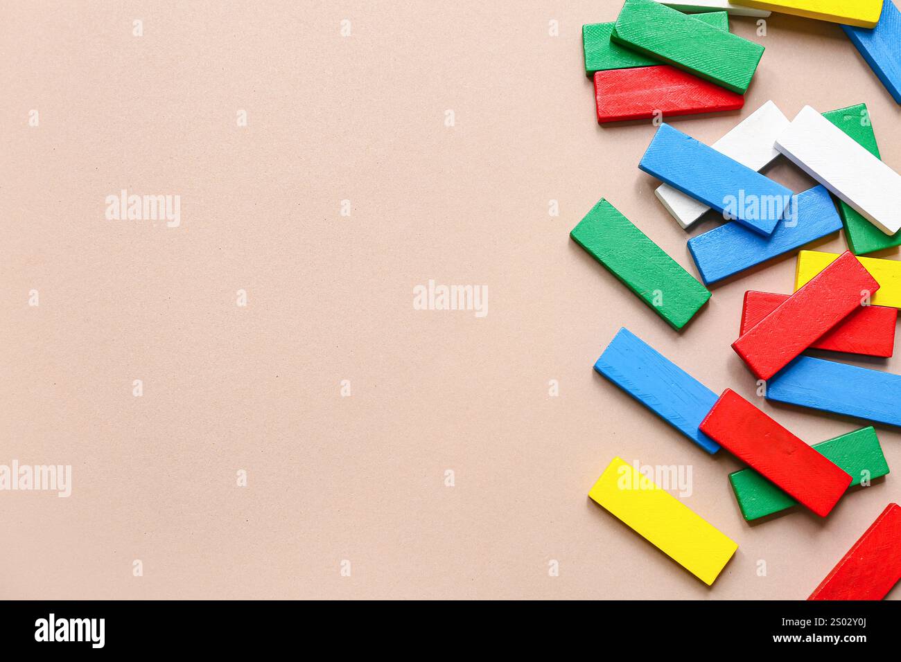 Colorful building blocks on beige background Stock Photo - Alamy