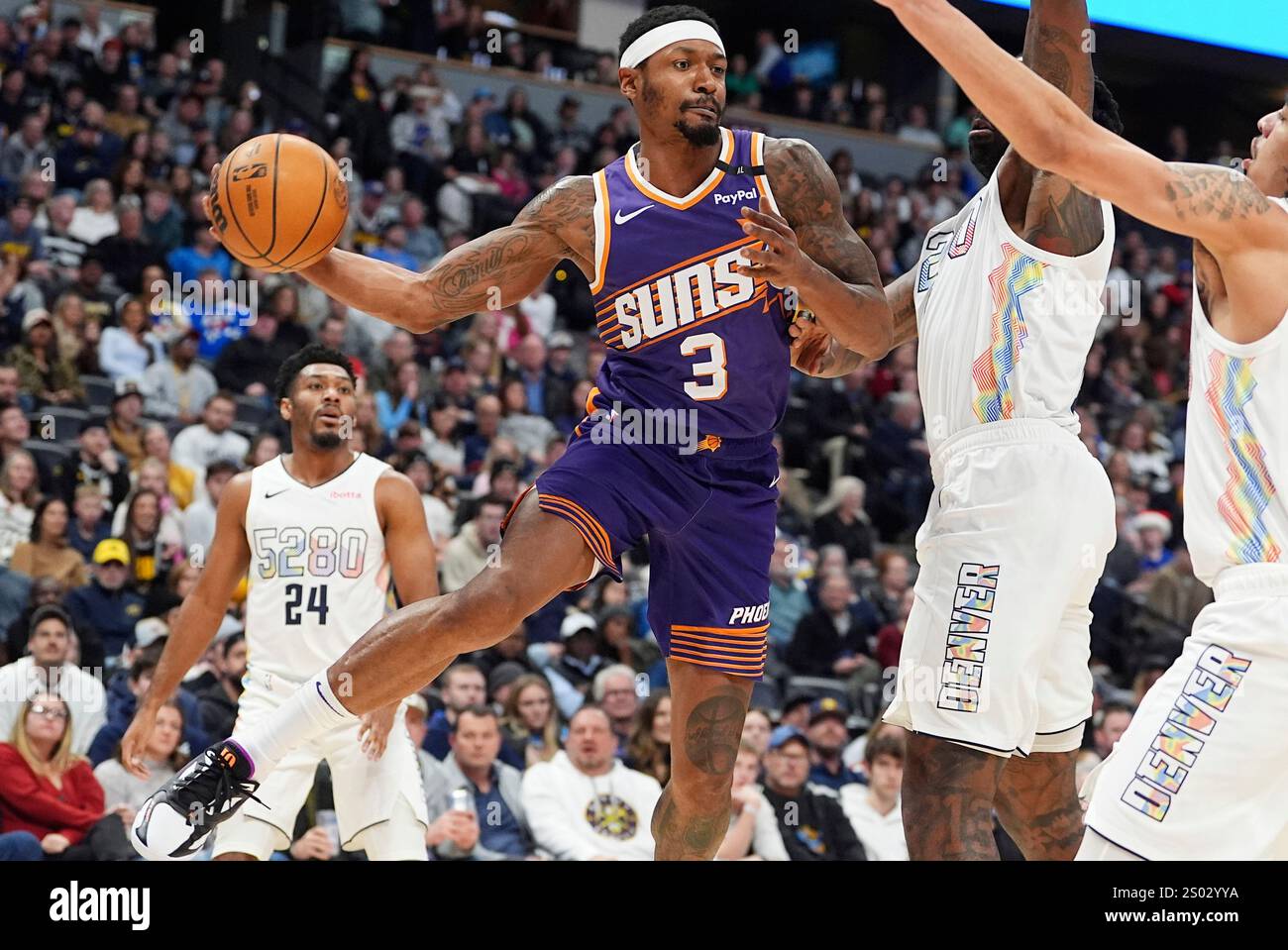 Phoenix Suns Guard Bradley Beal 3 Passes The Ball As Denver Nuggets