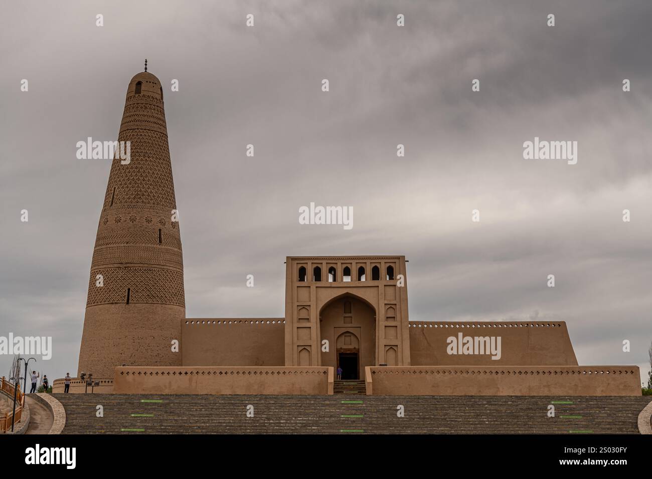 The Emin minaret and Uyghur mosque visible from behind the tombs in ...