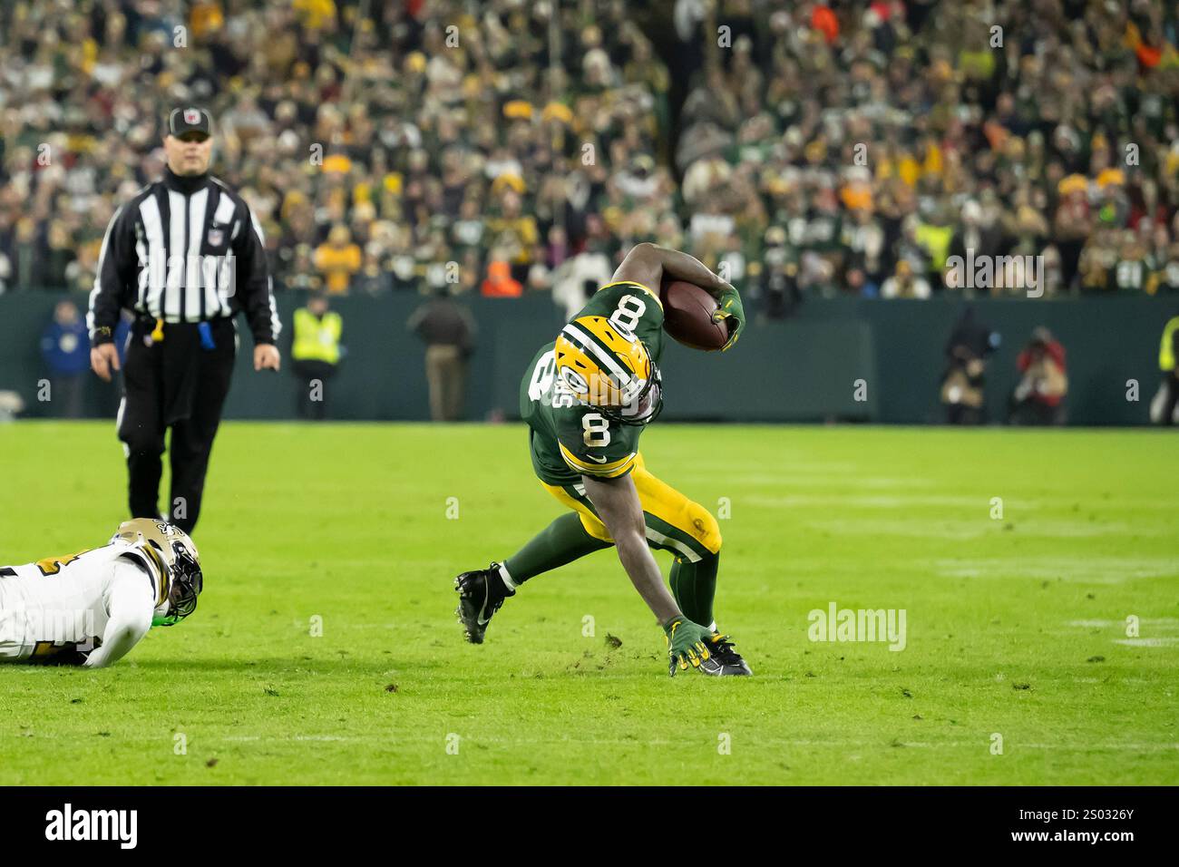 Green Bay, WI, USA. 23rd Dec, 2024. Green Bay Packers running back Josh ...