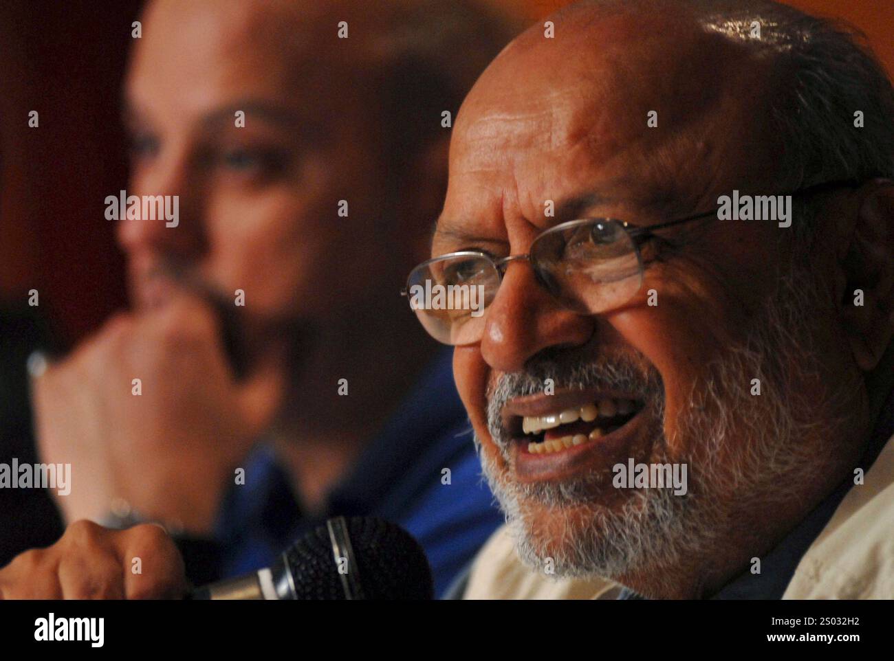FILE - Indian film directors Shyam Benegal, right, is seen during a ...