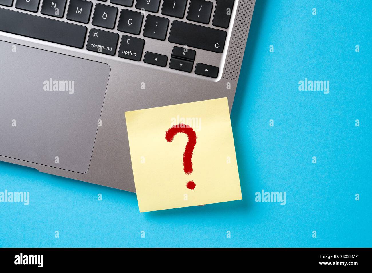 A question mark was written on a sticky note paper attached to the ...