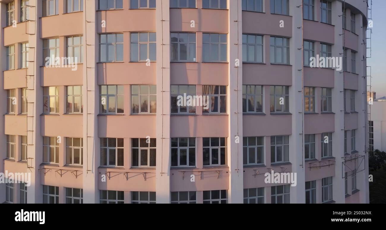 A Modern Round Building featuring Glass Windows beautifully situated at ...