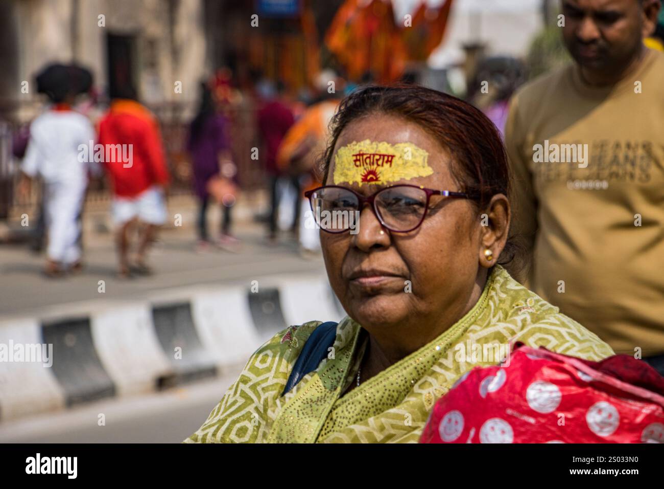Pilgrims in colourful clothes and ram-tilaka (forehead marking) on the ...
